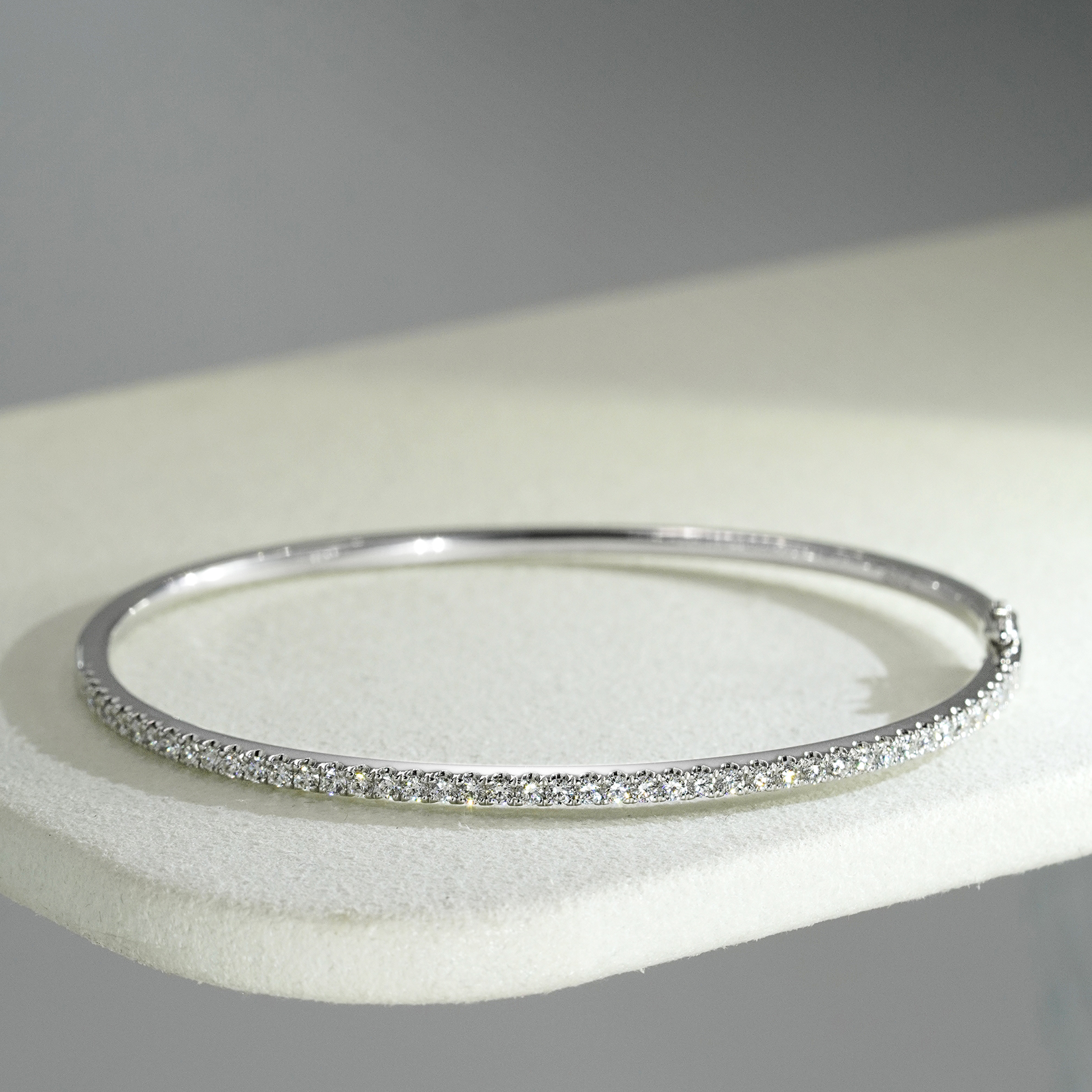 Gemma - A Half Eternity Diamond Bangle | Lavin New York | Diamond, You Buy It Right!